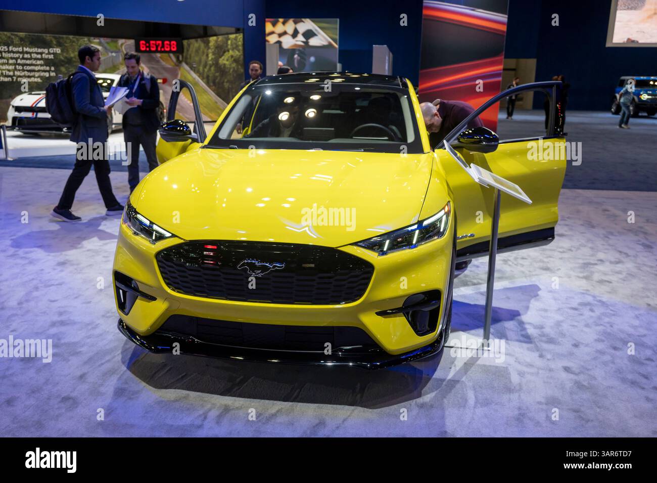 NEW YORK, NEW YORK - APRIL 16: People look at the new 2026 Ford Mustang ...