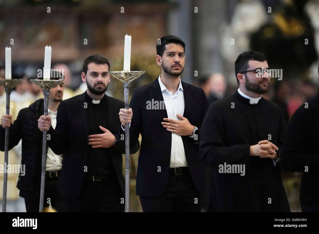 Participants arrive to attend the Chrism Mass on Ash presided by Delegate of the Holy Father ...