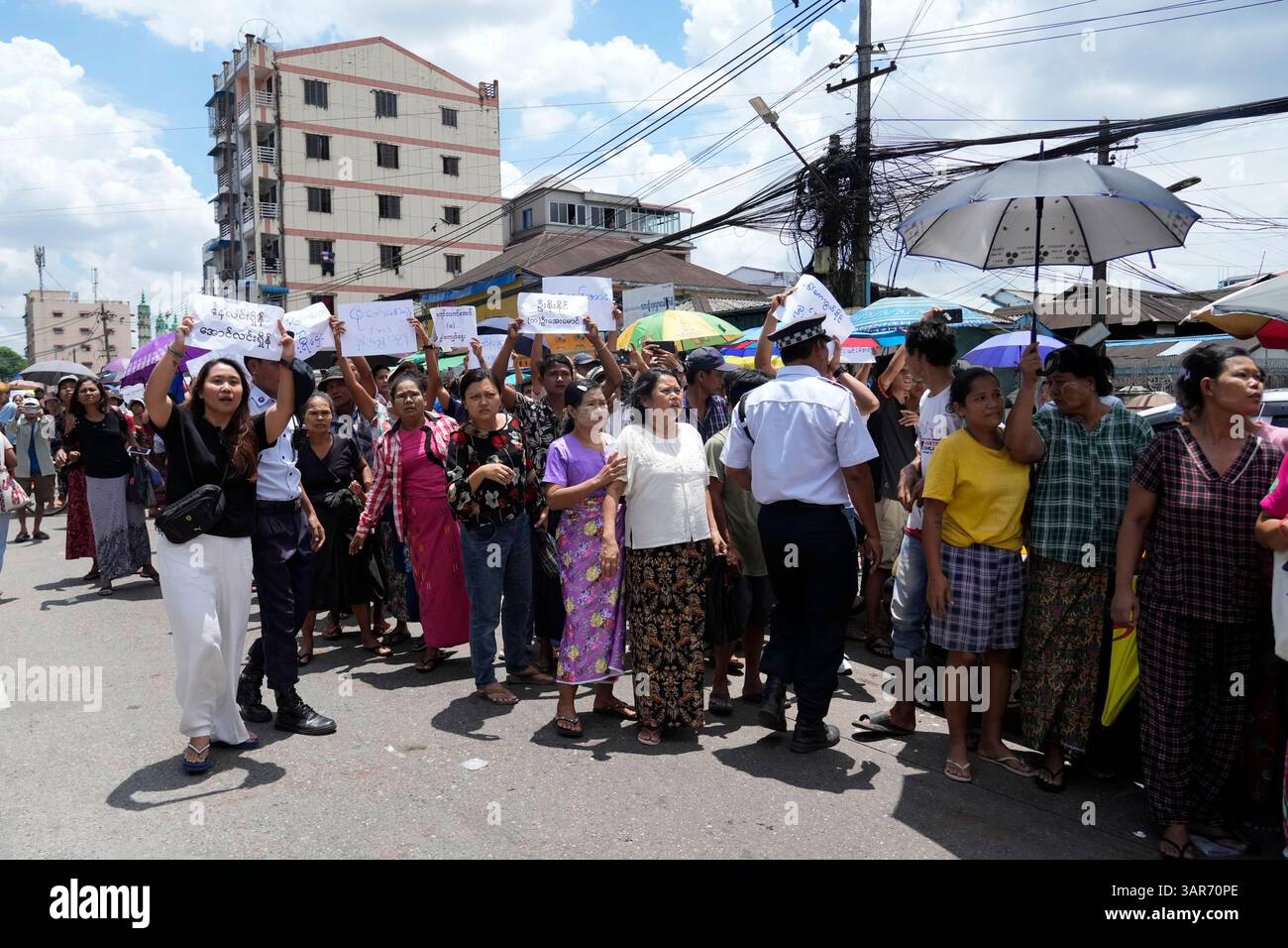 Family members and colleagues wait to welcome released prisoners ...