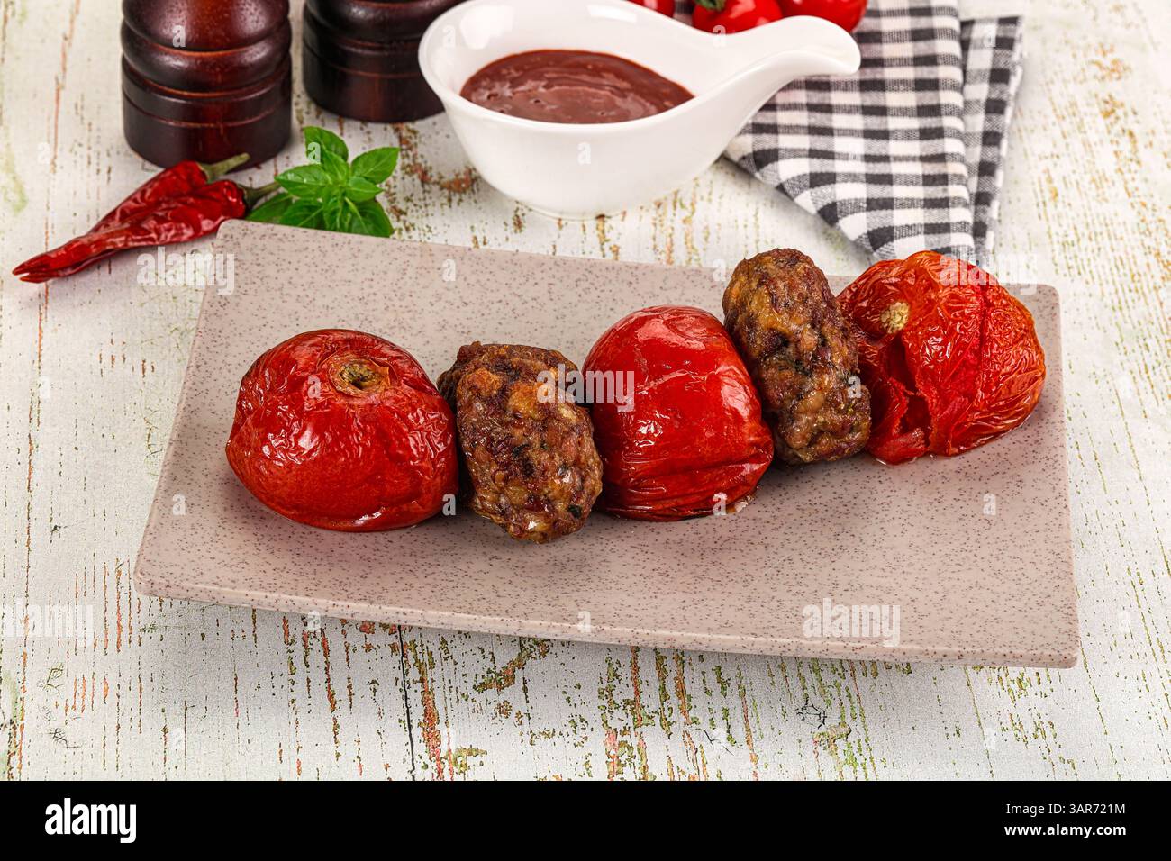 Turkish cuisine - Domatesli Kebab with minced meat and tomato Stock ...