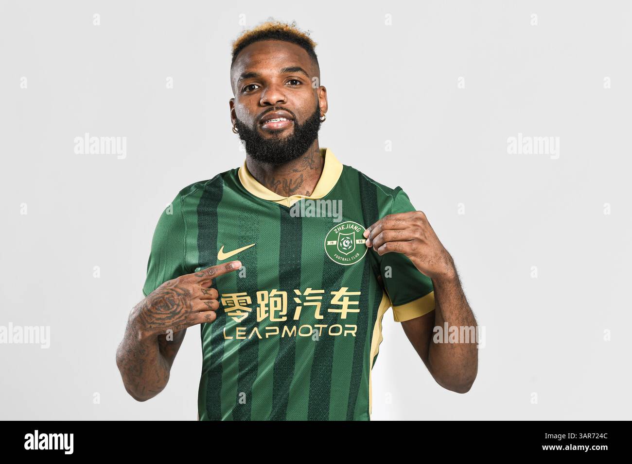 Aaron Boupendza of Zhejiang FC poses during the filming session of ...