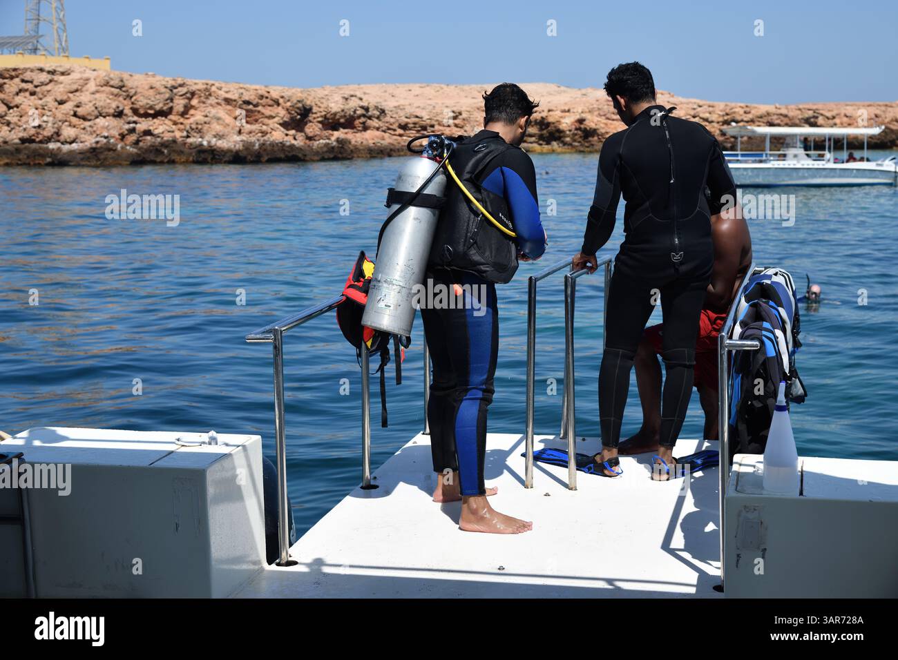 Daymaniyat islands, Oman - April 02, 2025: Scuba diving. Two divers ...