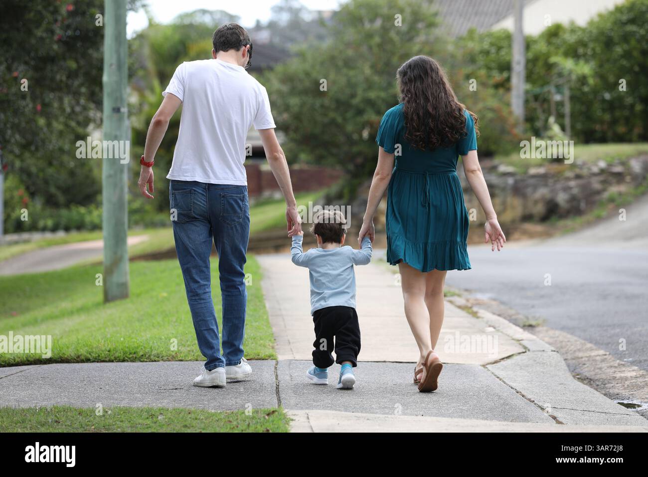 A family with a child in Sydney, Thursday, April 17, 2025. (AAP Image ...