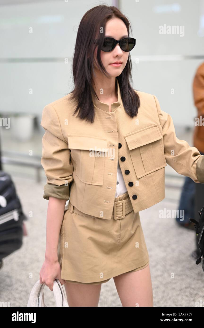 Chinese actress Chen Duling appears at the airport in Shanghai, China, 15 April, 2025 Stock ...