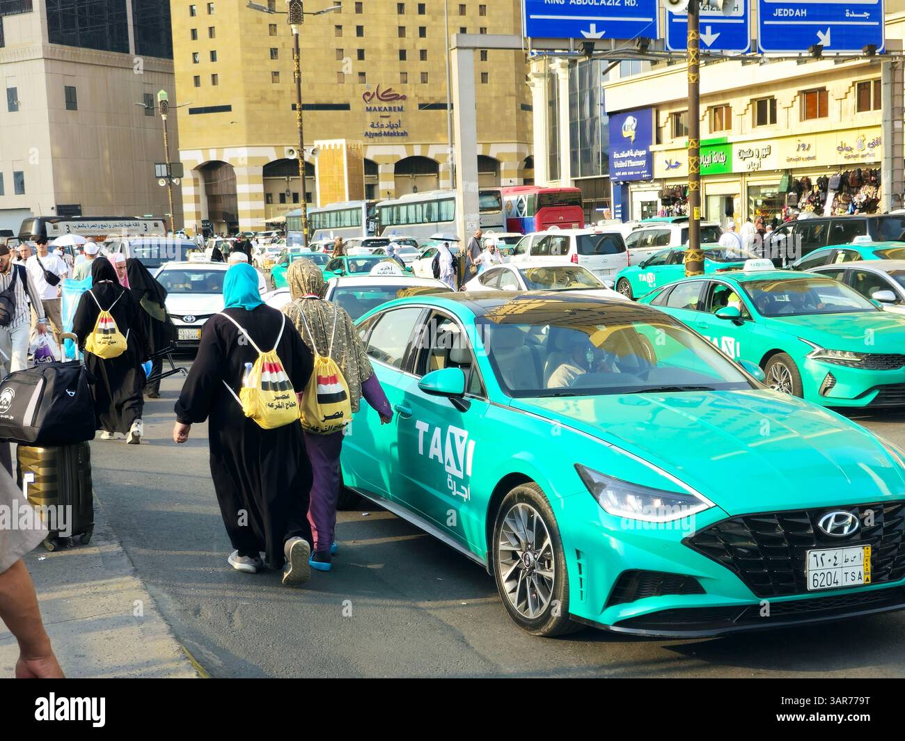 Mecca, Saudi Arabia, June 19 2024: Mecca Makkah Taxi, used to transport Hajj pilgrims inside and ...
