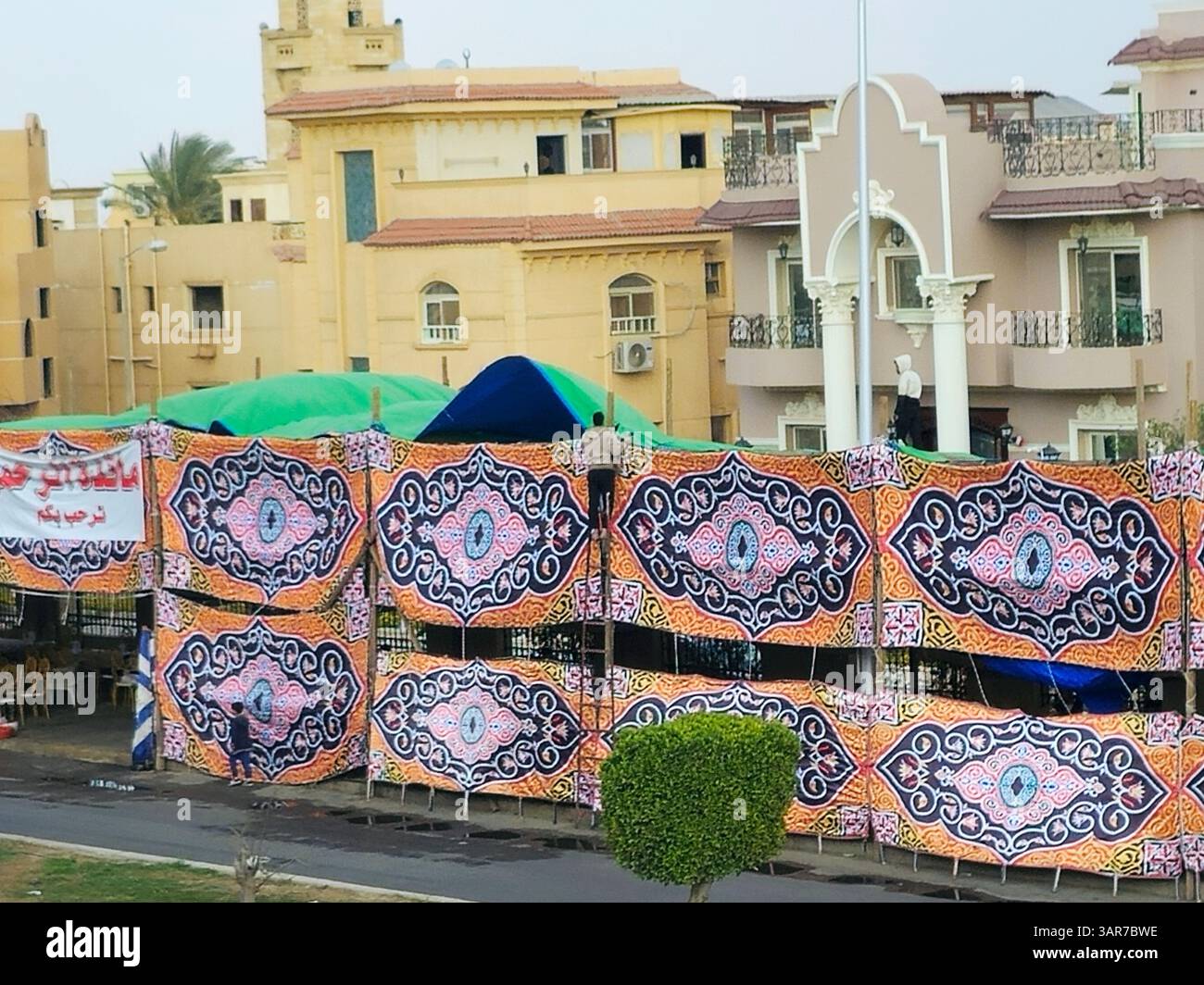 Giza, Egypt, March 21 2025: Preparations and setting The Ramadan tables ...