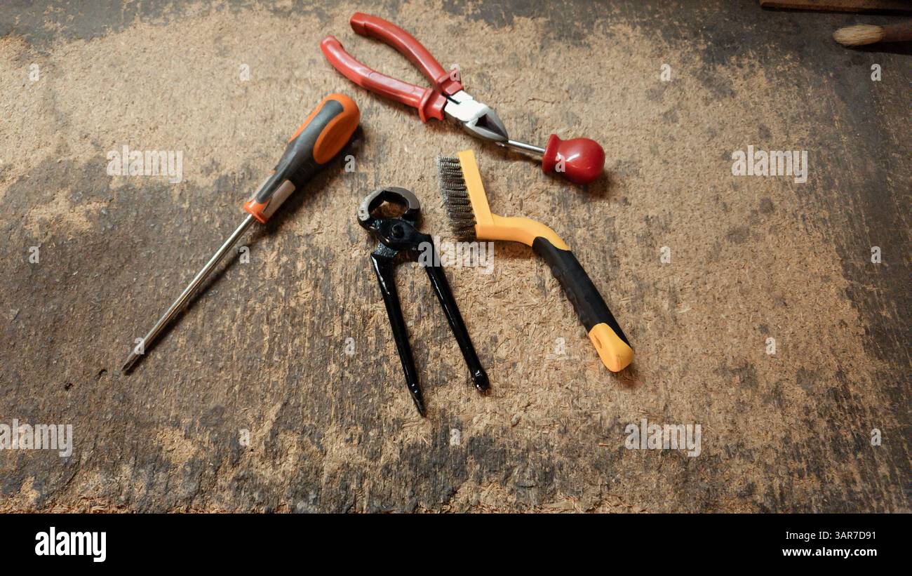 Various tools laying on workbench in warehouse, ready for use Stock ...