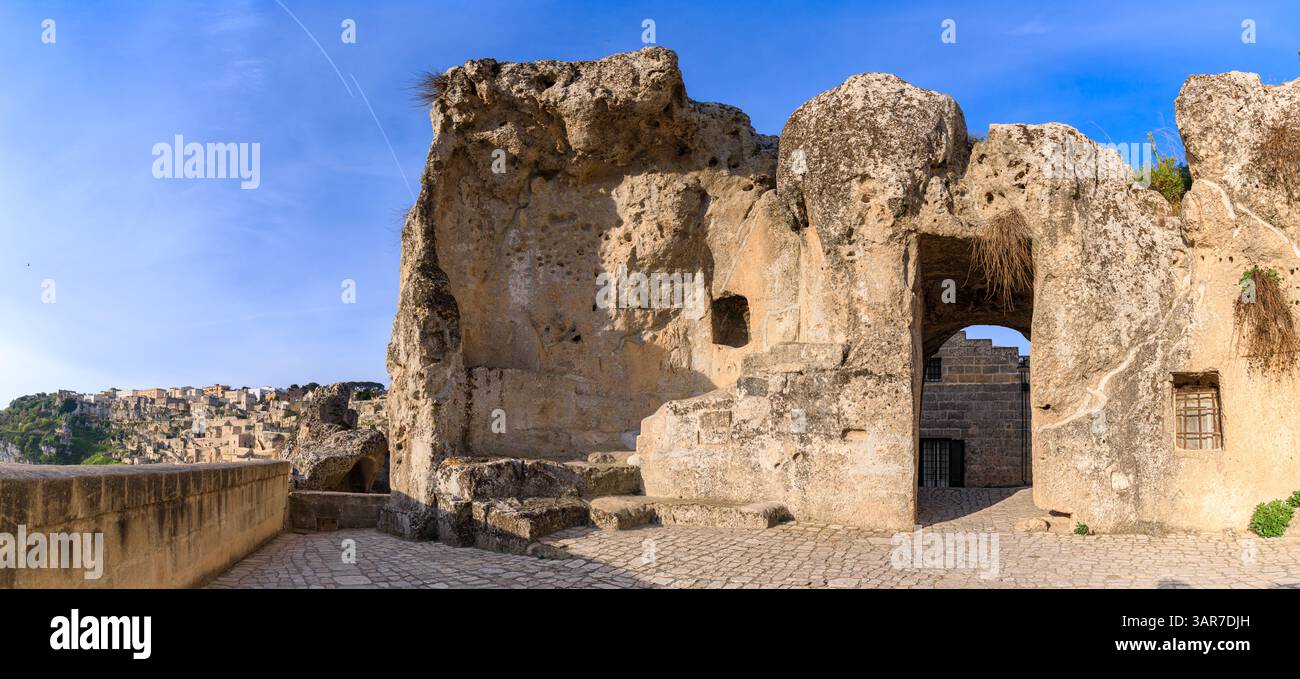 Glimpse of the Sassi di Matera townscape from the remains of a cave ...