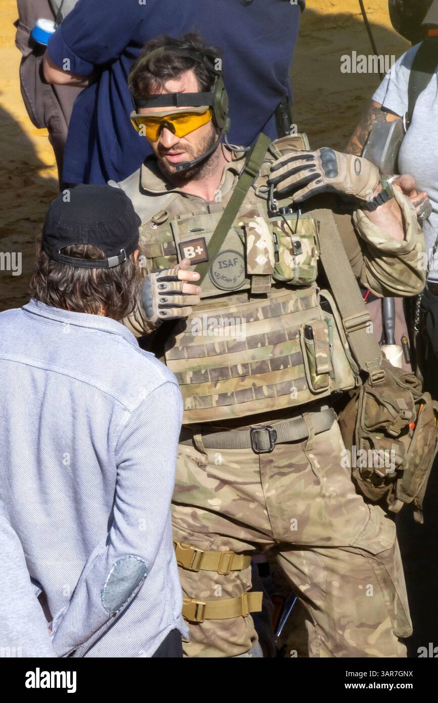Arron Taylor and Theo James filming Fuze in a Quarry in Kent Stock ...