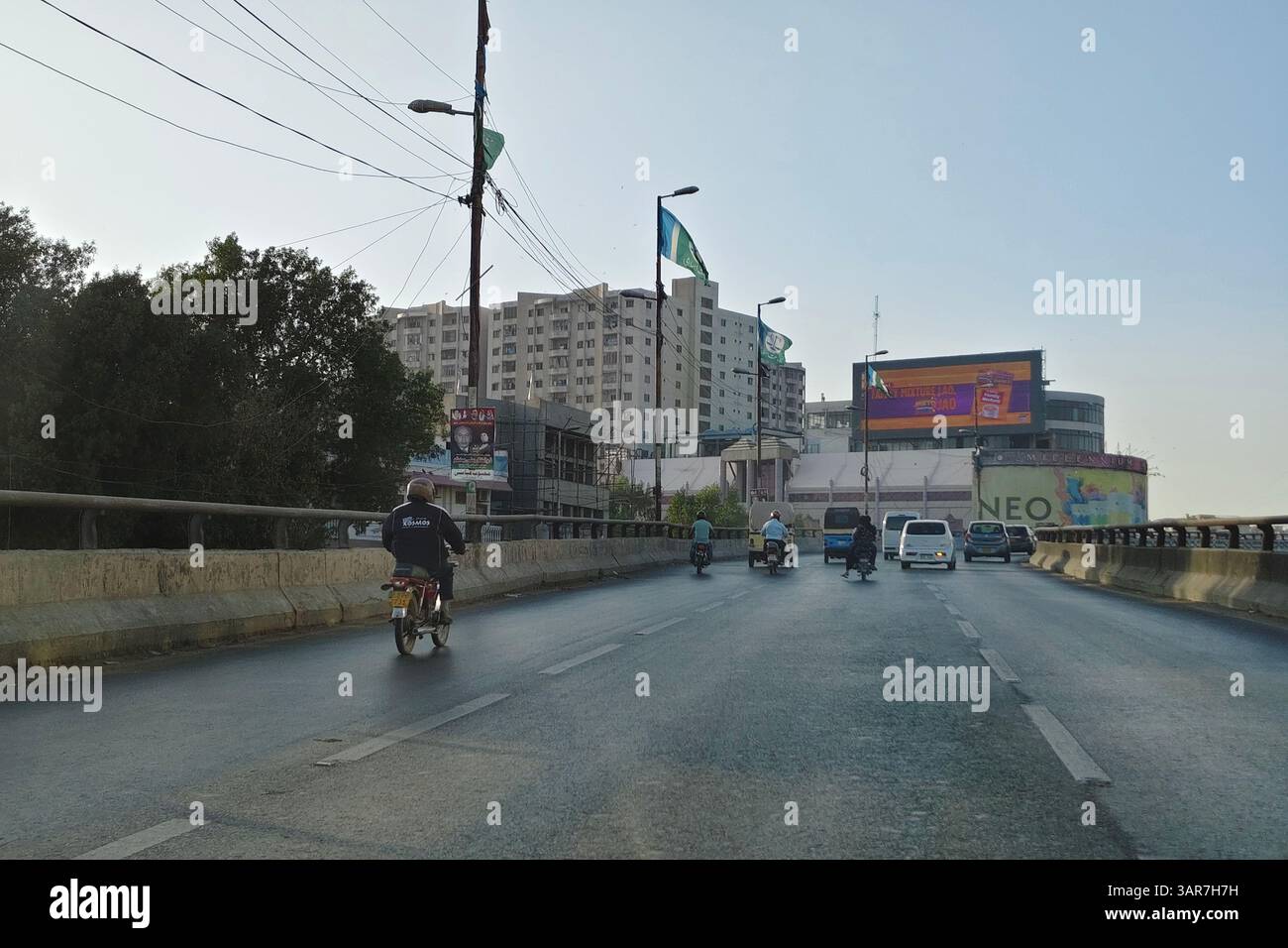 Karachi roads and traffic sunset time. Drigh Road Karachi Stock Photo ...