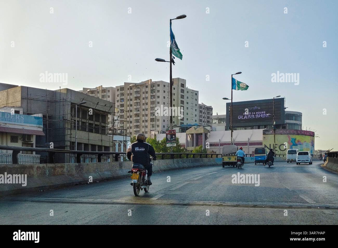 Karachi roads and traffic sunset time. Drigh Road Karachi Stock Photo ...