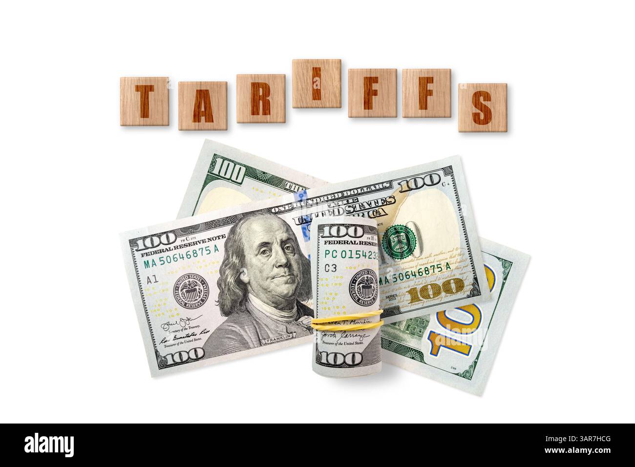 Dollars on a white background with word TARIFFS. Trade, duty, customs ...