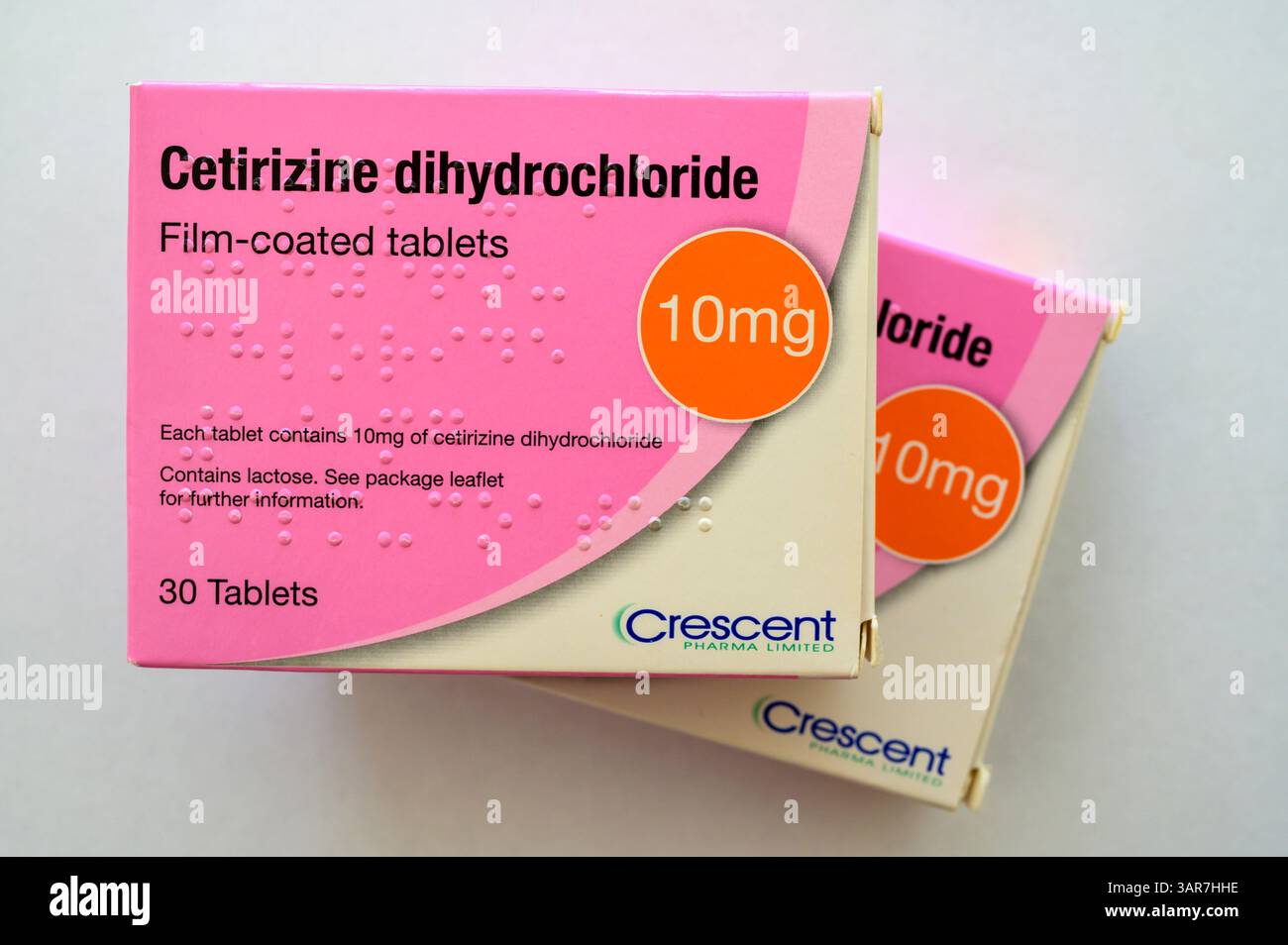 Packets of Cetirizine dihydrochloride antihistamine tablets for allergy ...