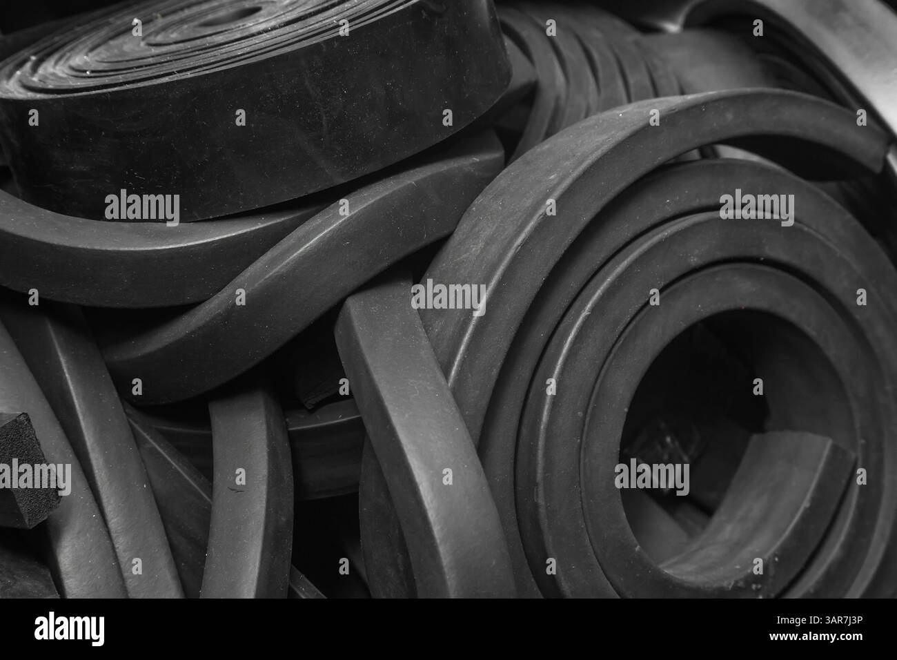Close-up rubber sealing strips for waterproof doors. A pile of rubber ...