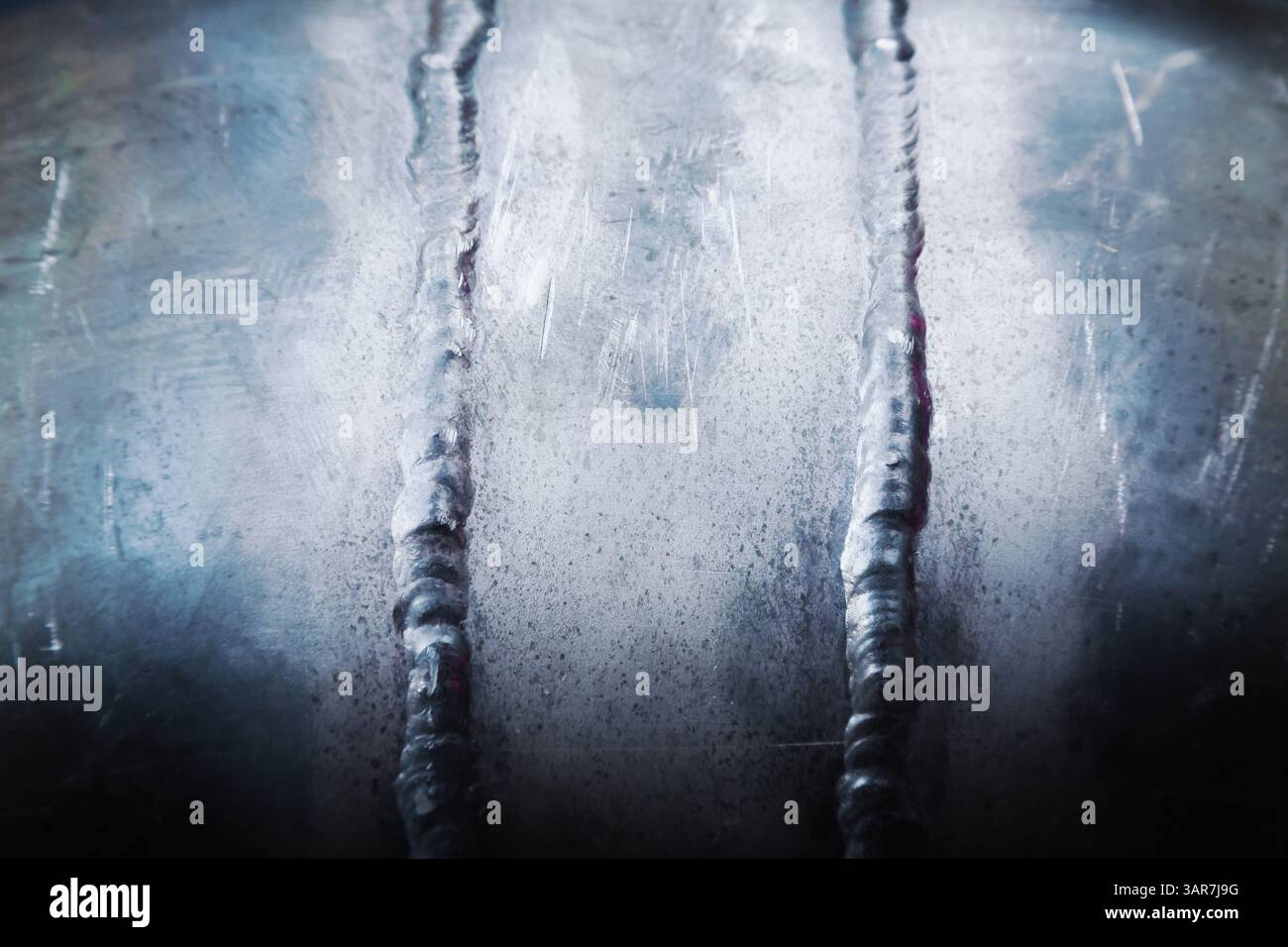 Two vertical welding seams on a steel pipe, close-up Stock Photo - Alamy