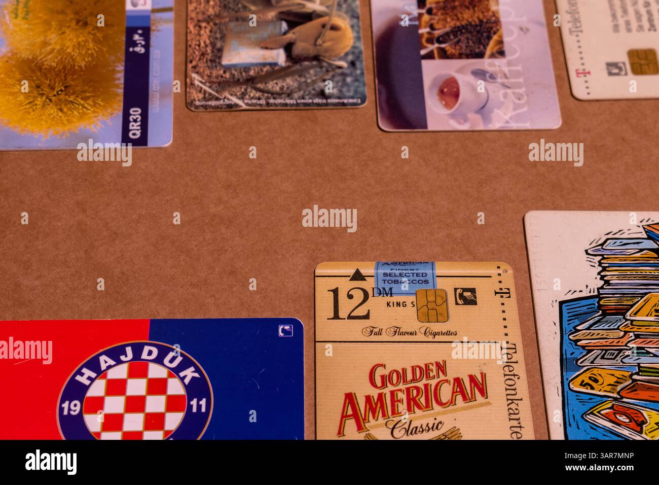 Vintage telephone calling cards isolated on cardboard; old phone top-up ...