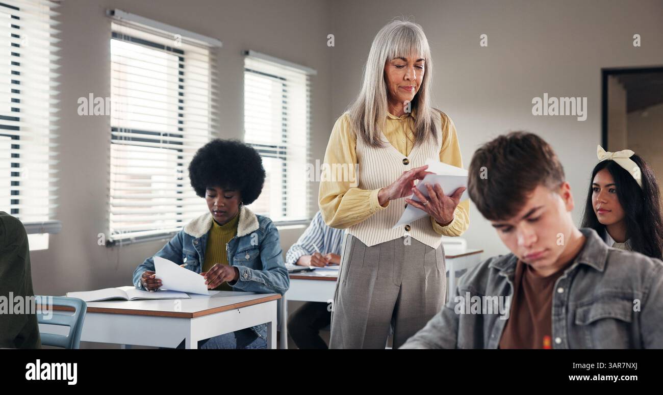 Test, high school and teacher in classroom with paper, exam and ...