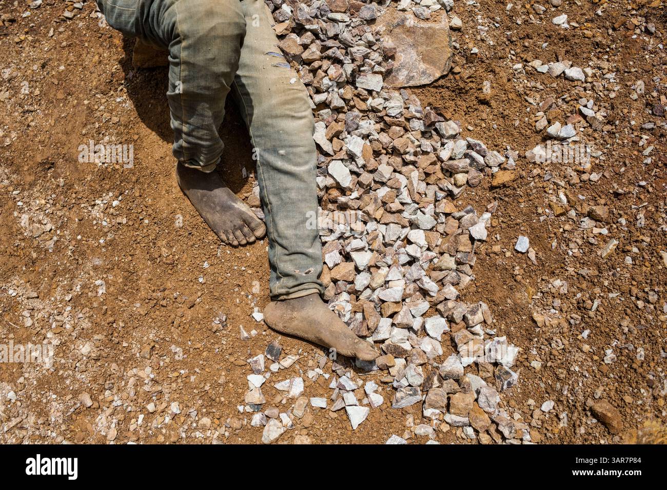 Stone breakers in West Uganda, Africa Stock Photo - Alamy