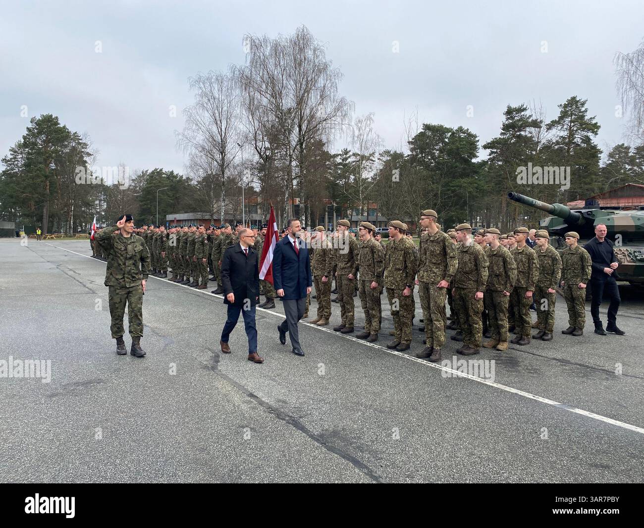 Adazi, Latvia. 17th Apr, 2025. Andris Spruds (2nd from left), Minister ...