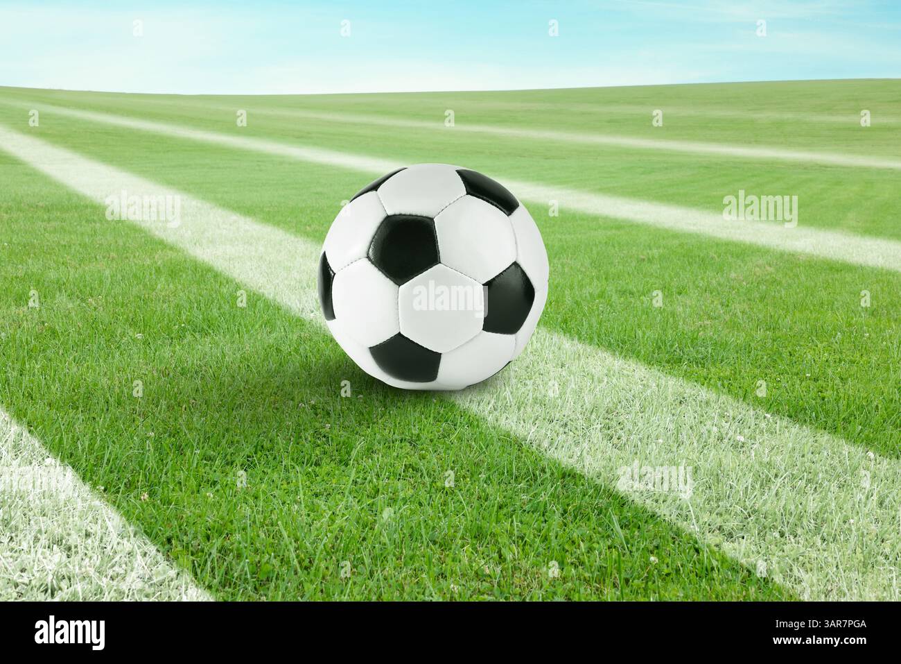 Soccer ball on football field with markings outdoors Stock Photo - Alamy