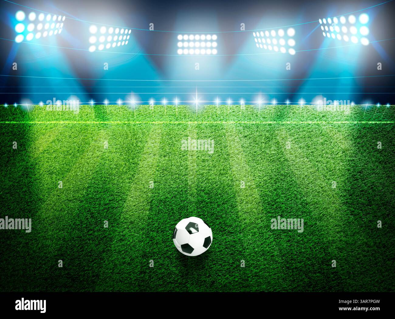 Soccer ball on football field at stadium Stock Photo - Alamy