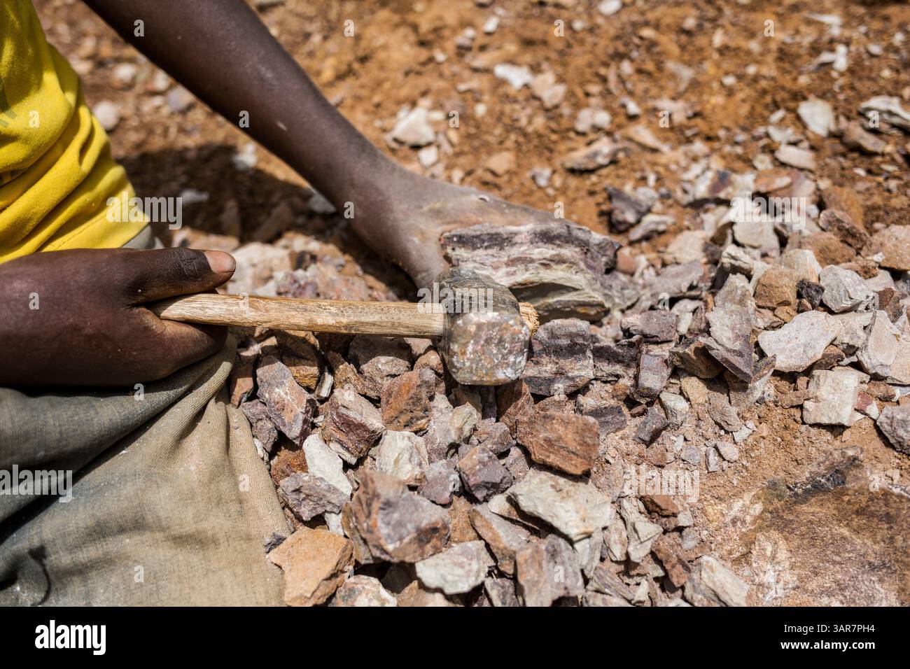 Stone breakers in West Uganda, Africa Stock Photo - Alamy