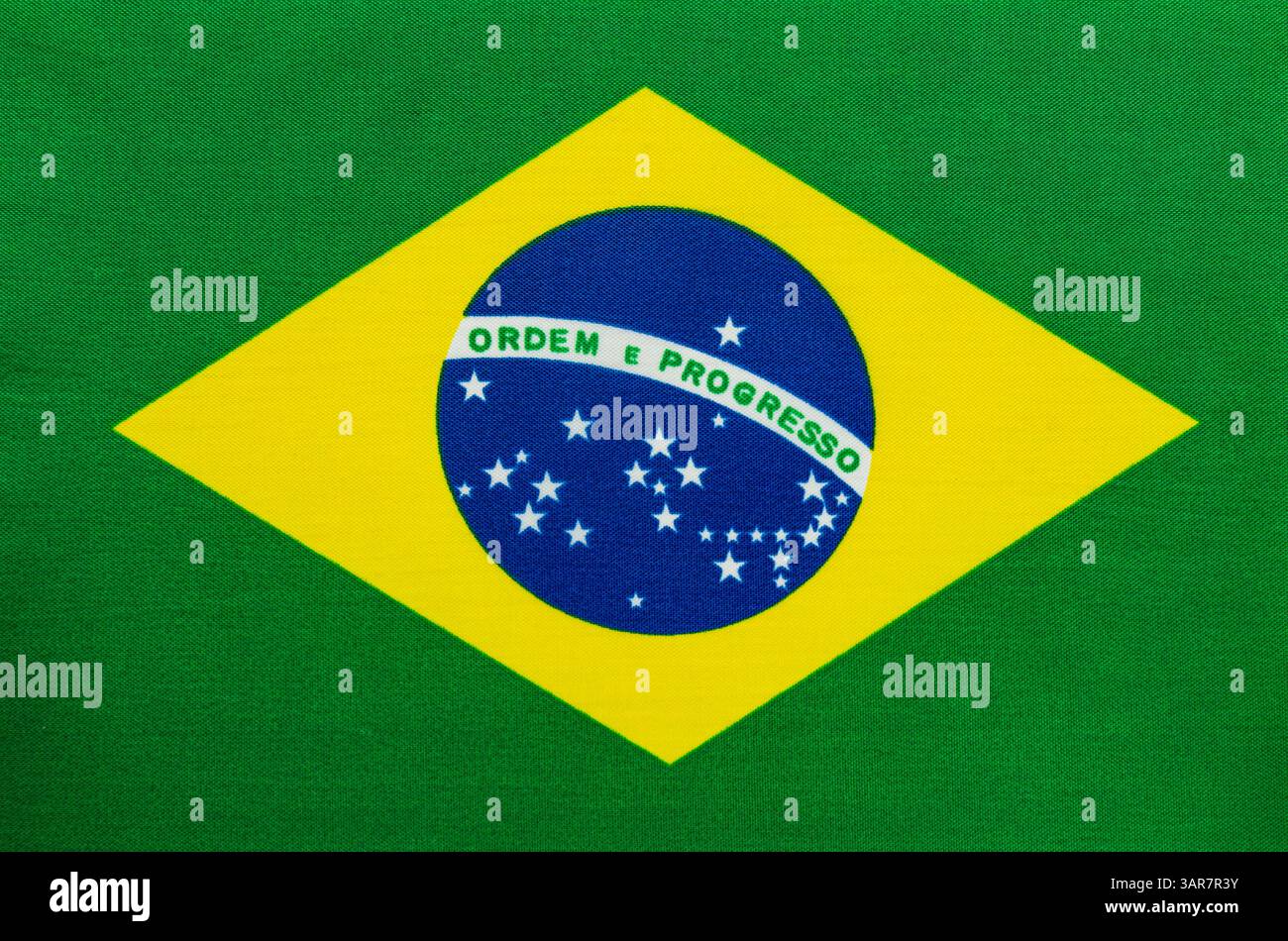 Bright Brazilian flag features a green field, yellow diamond, and blue ...