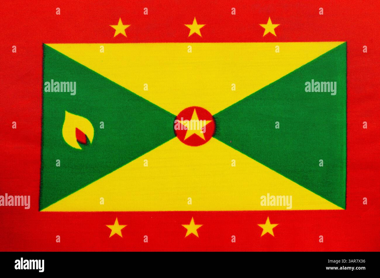 The flag of Grenada features a green and yellow design with a red ...