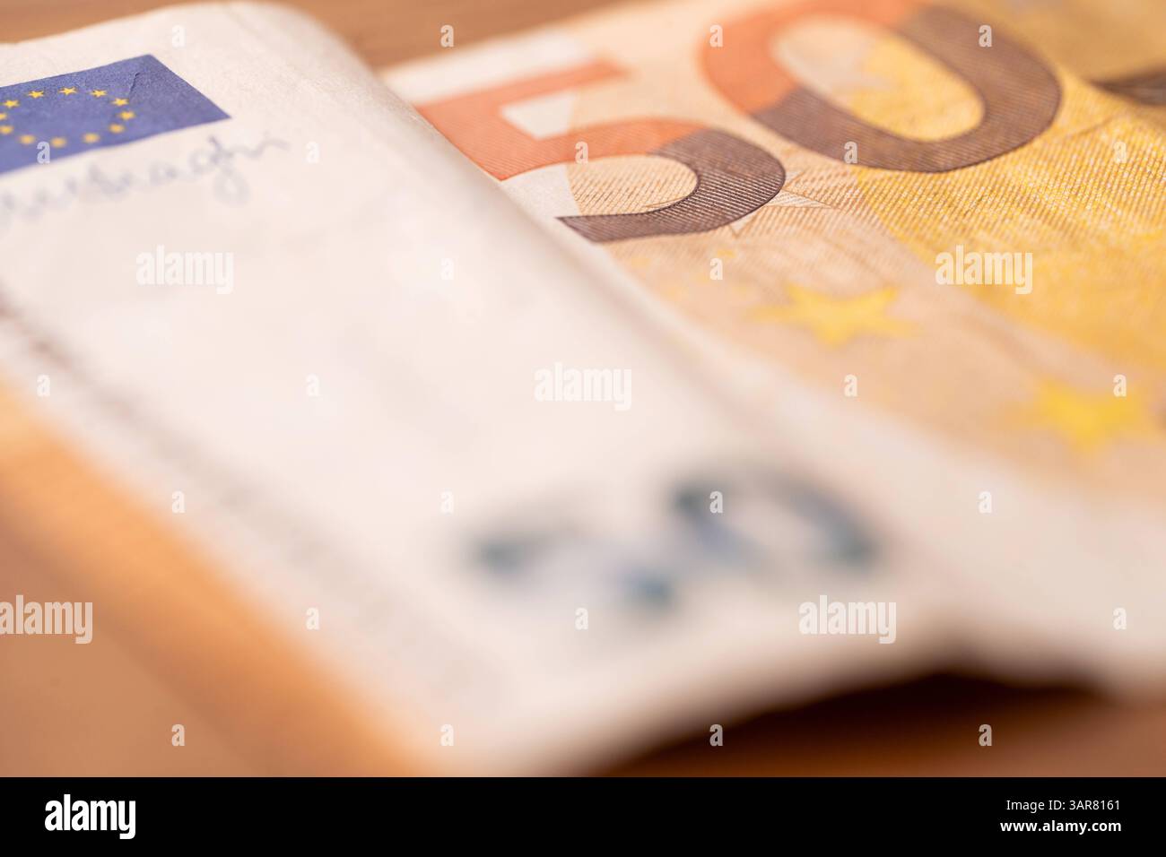 Bavaria, Germany - April 16, 2025: A 50-euro banknote with a focus on ...