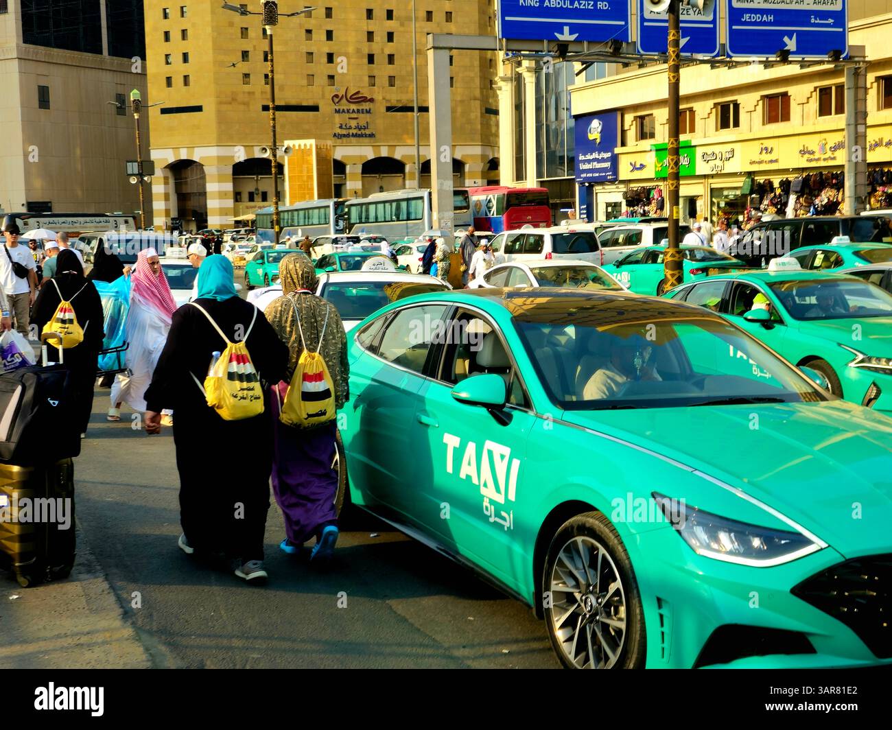 Mecca, Saudi Arabia, June 19 2024: Mecca Makkah Taxi, used to transport Hajj pilgrims inside and ...
