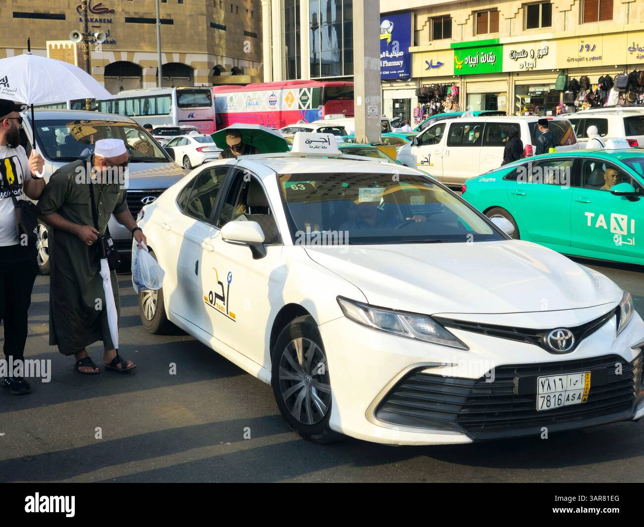 Mecca, Saudi Arabia, June 19 2024: Mecca Makkah Taxi, used to transport Hajj pilgrims inside and ...
