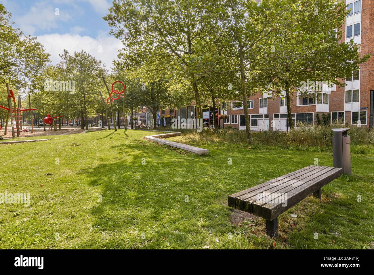 A vibrant park featuring lush greenery, durable benches, and modern ...