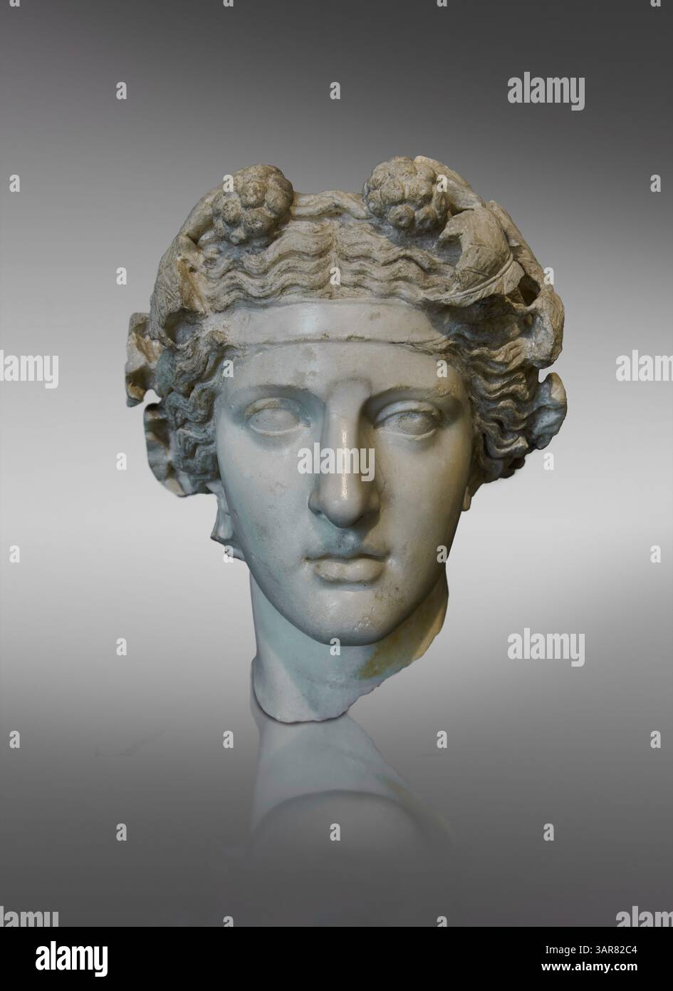 Roman sculpted head of Dionysus inspired by a Hellenistic original ...
