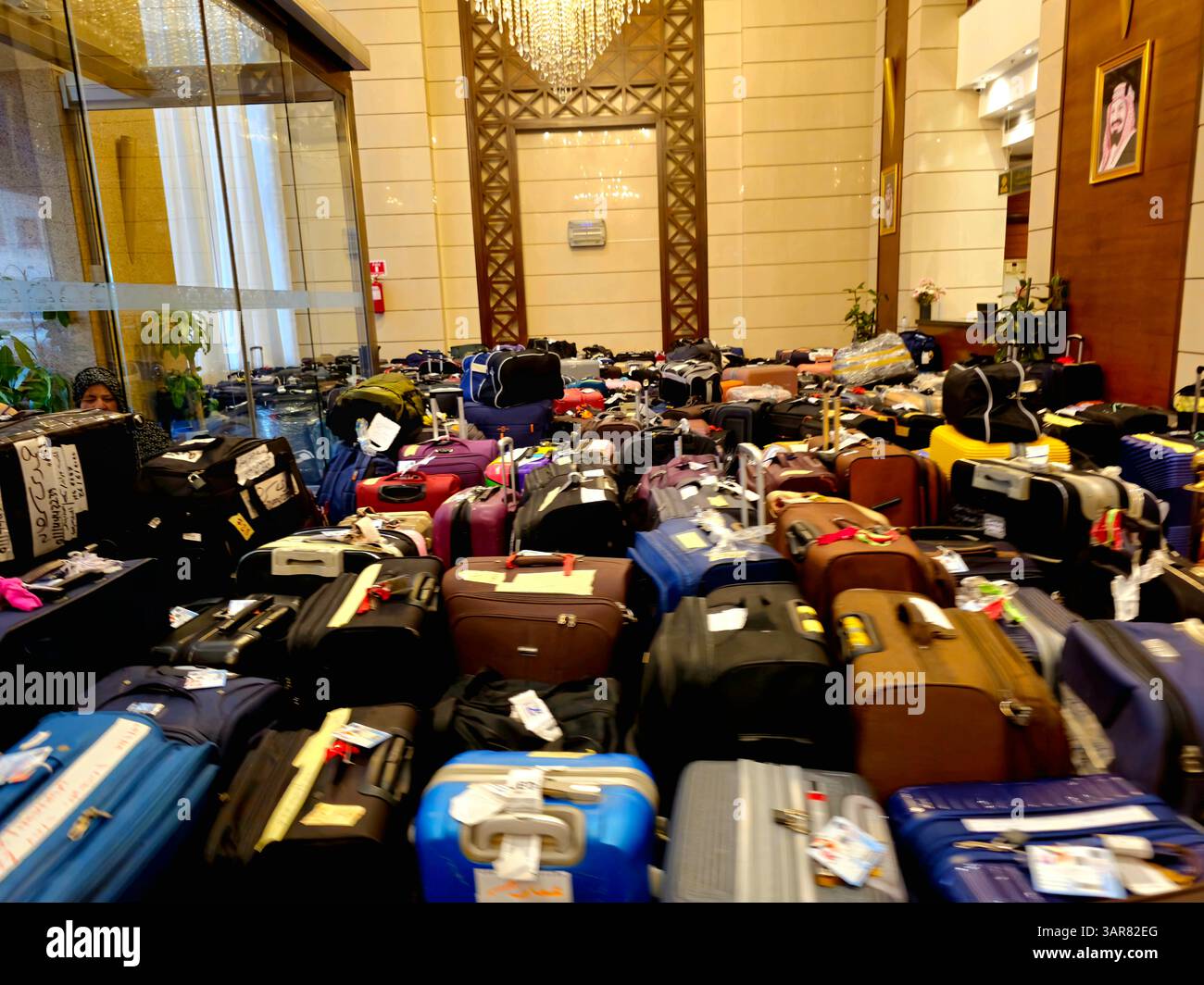 Mecca, Saudi Arabia, June 21 2024: collecting the luggage of pilgrims ...