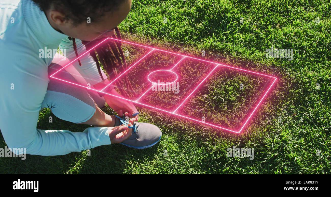 Neon soccer field layout icon spinning against african american fit ...