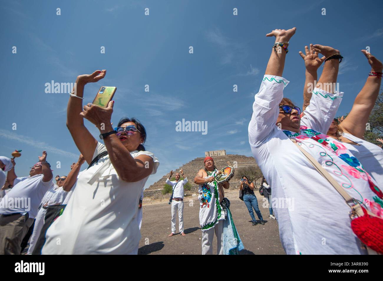 People Welcoming Spring Equinox in Queretaro People rise their hands ...