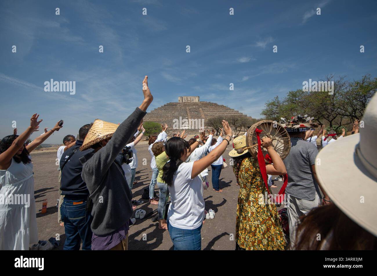 People Welcoming Spring Equinox in Queretaro People rise their hands ...
