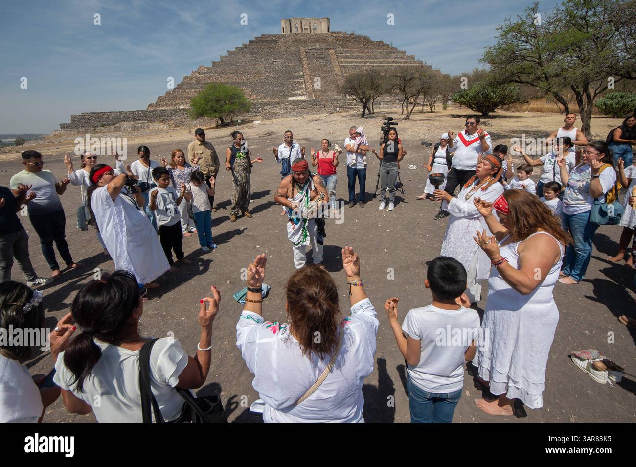 People Welcoming Spring Equinox in Queretaro People rise their hands ...