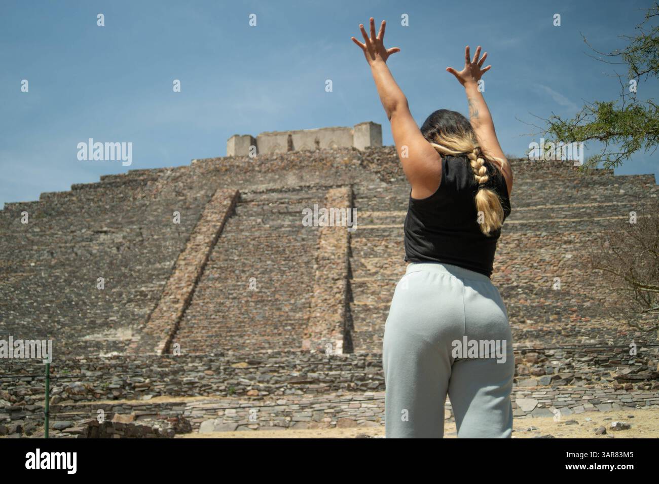People Welcoming Spring Equinox in Queretaro A woman rises her hands ...