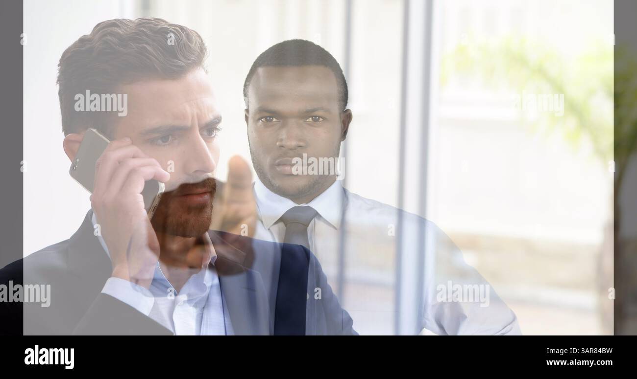 Image of caucasian man having call over african american businessman ...