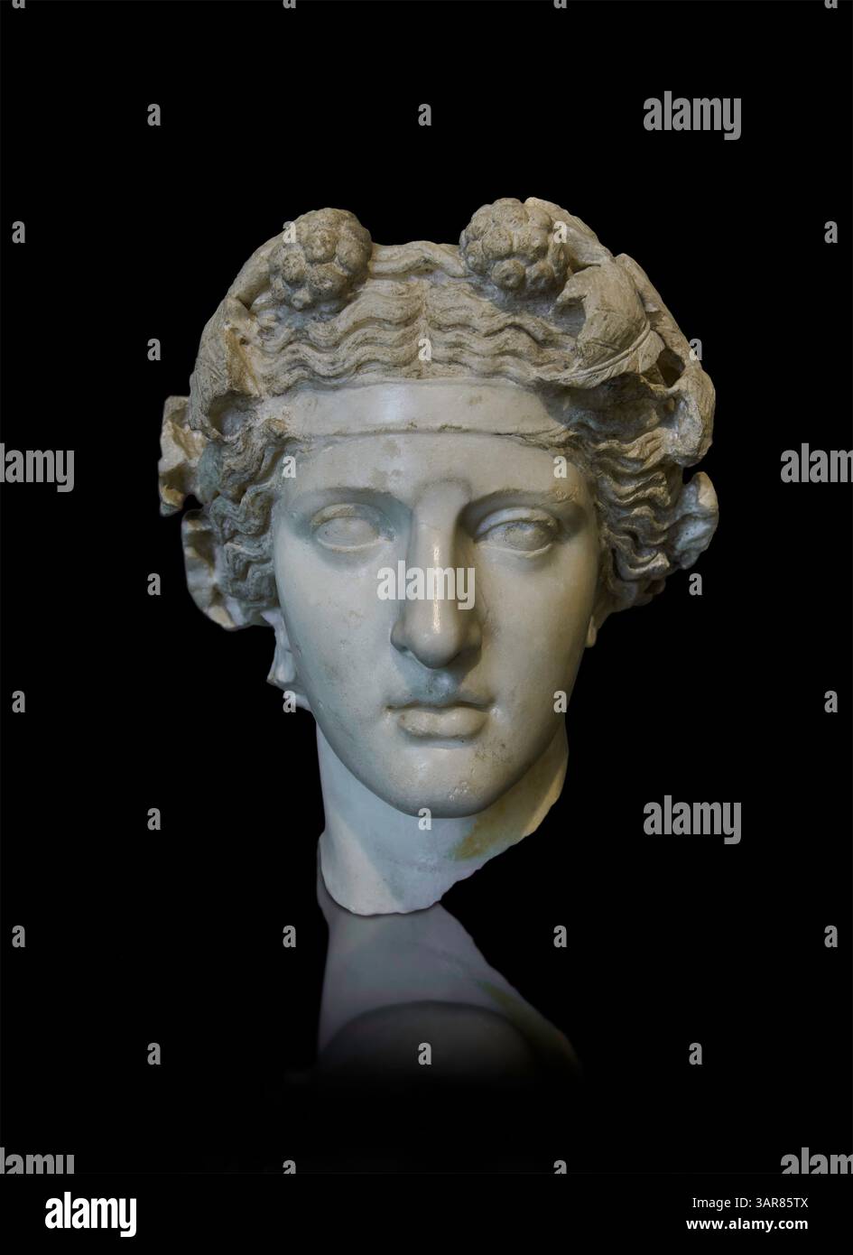 Roman sculpted head of Dionysus inspired by a Hellenistic original ...