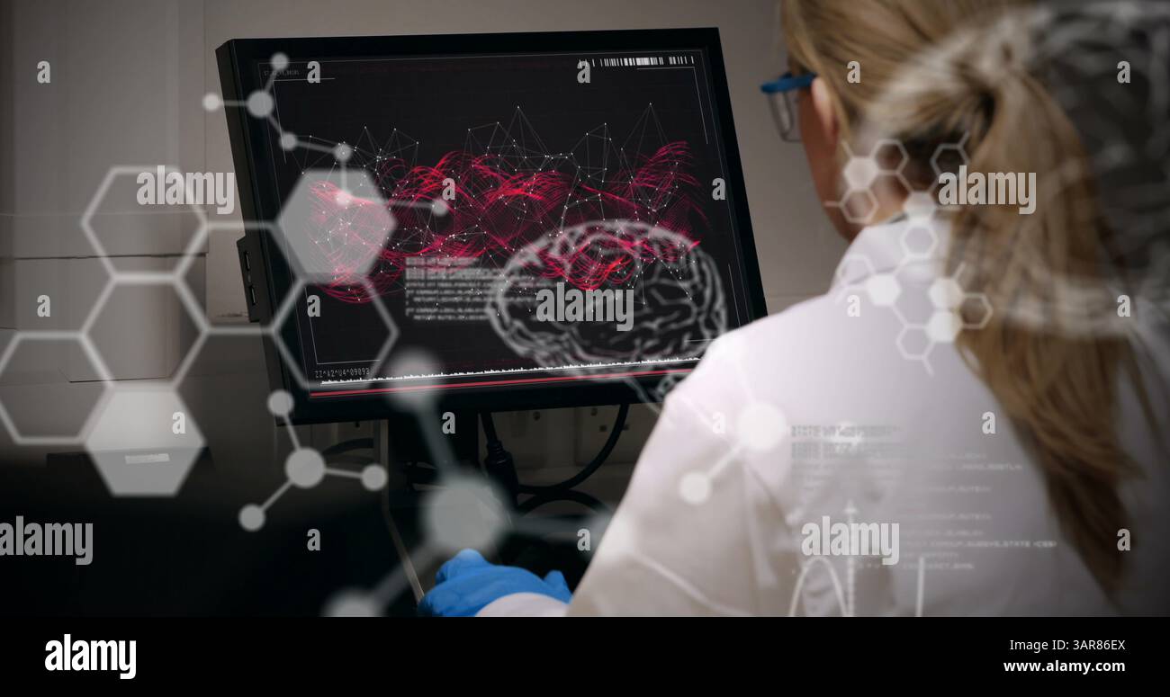 Image of human brain spinning over female scientist using computer ...