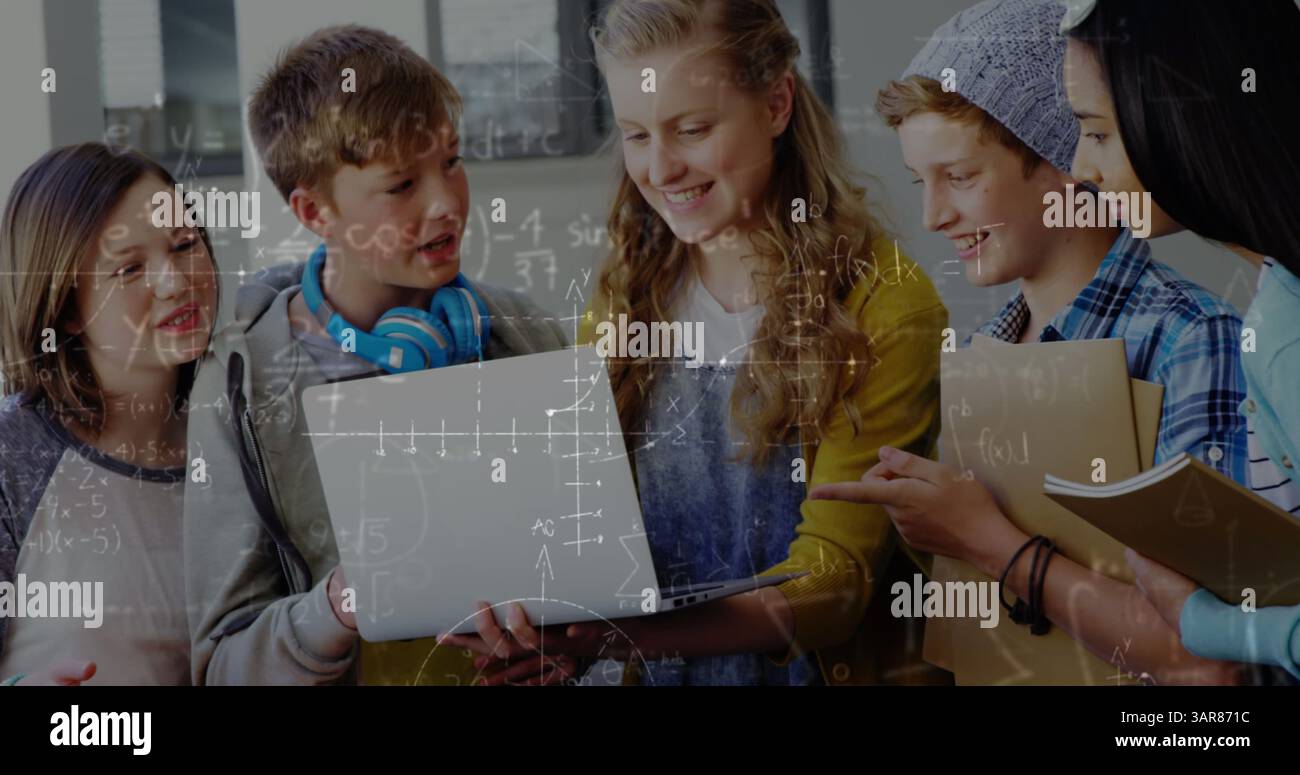 Image of mathematical equations over school children using laptop in ...