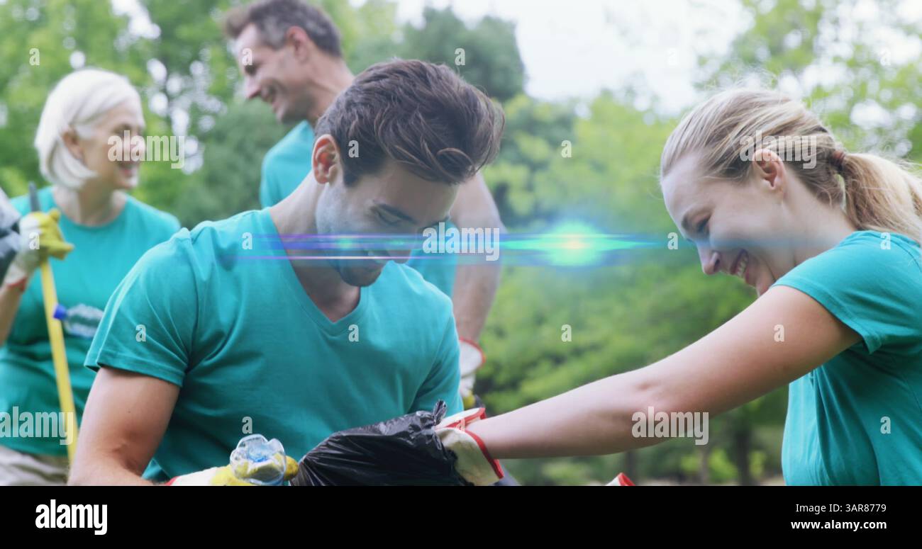 Image of lights over happy caucasian family picking up rubbish in ...