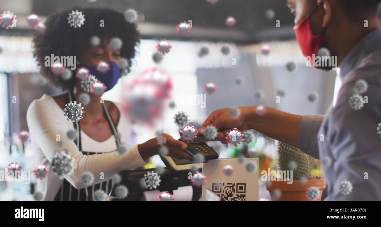 Image of virus cells over diverse people wearing face masks. global medicine, medical services ...