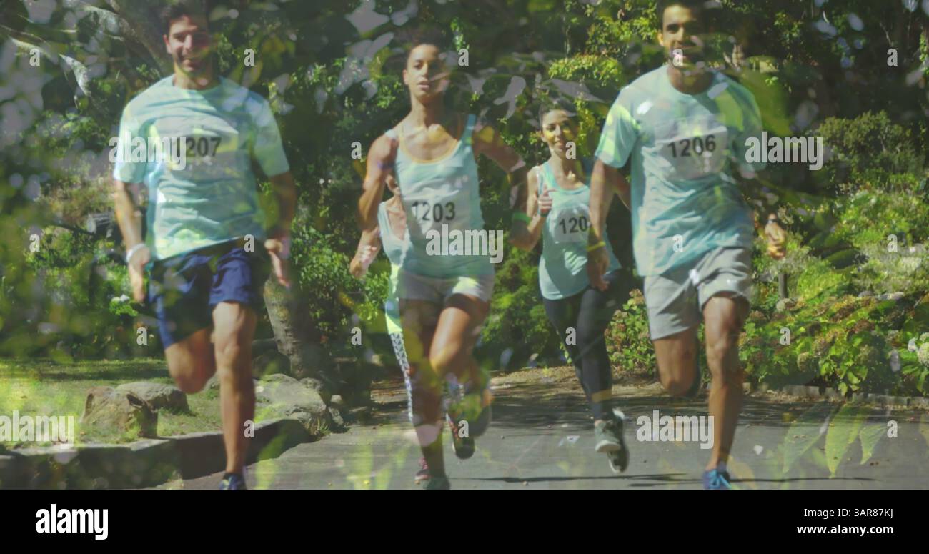 Image of group of happy caucasian male and female runners in park over ...