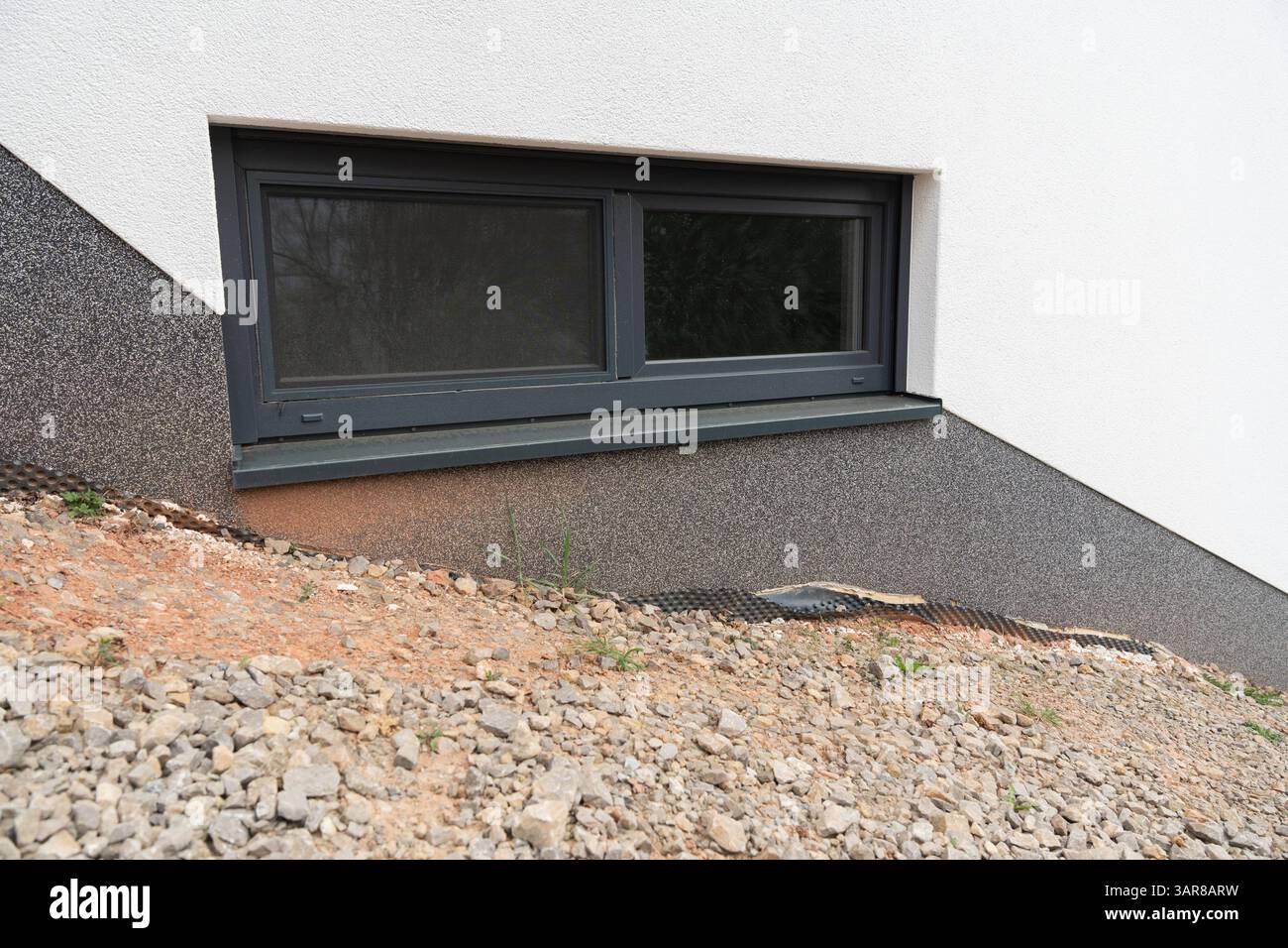 Modern basement window partially hi-res stock photography and images ...