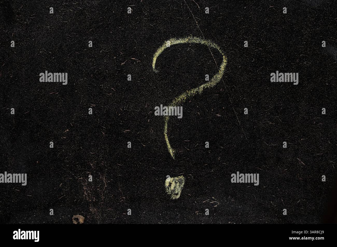 A question mark drawn with chalk on a school blackboard, ask a question ...