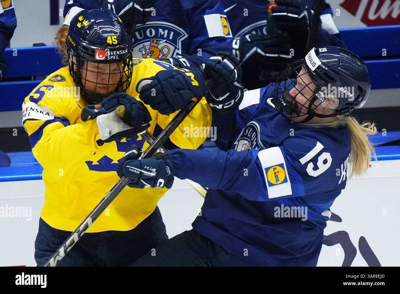Sweden's Paula Bergstrom, left, checks Finland's Ida Kuoppala during ...