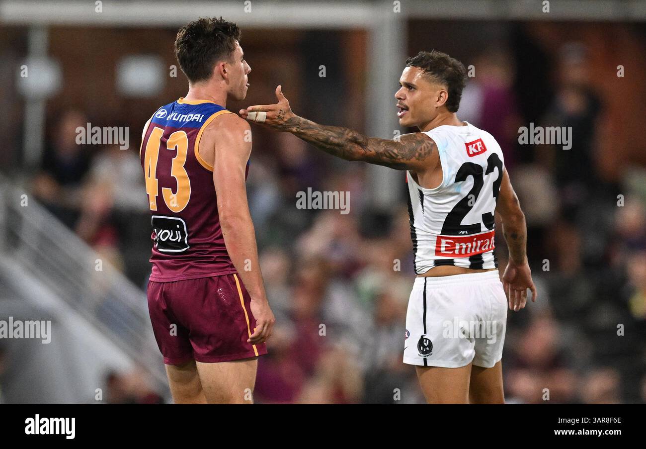 Bobby Hill of the Magpies reacts with Noah Answerth of the Lions during ...